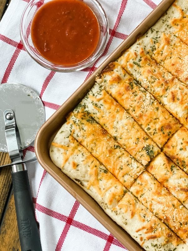 Cheesy Sheet Pan Breadsticks - Pound Dropper